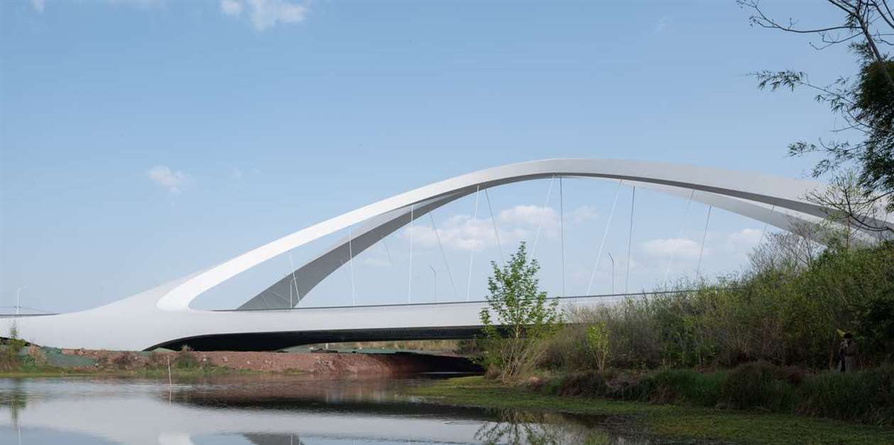 Zaha Hadid Architects unveils the first in a series of bridges in China ...